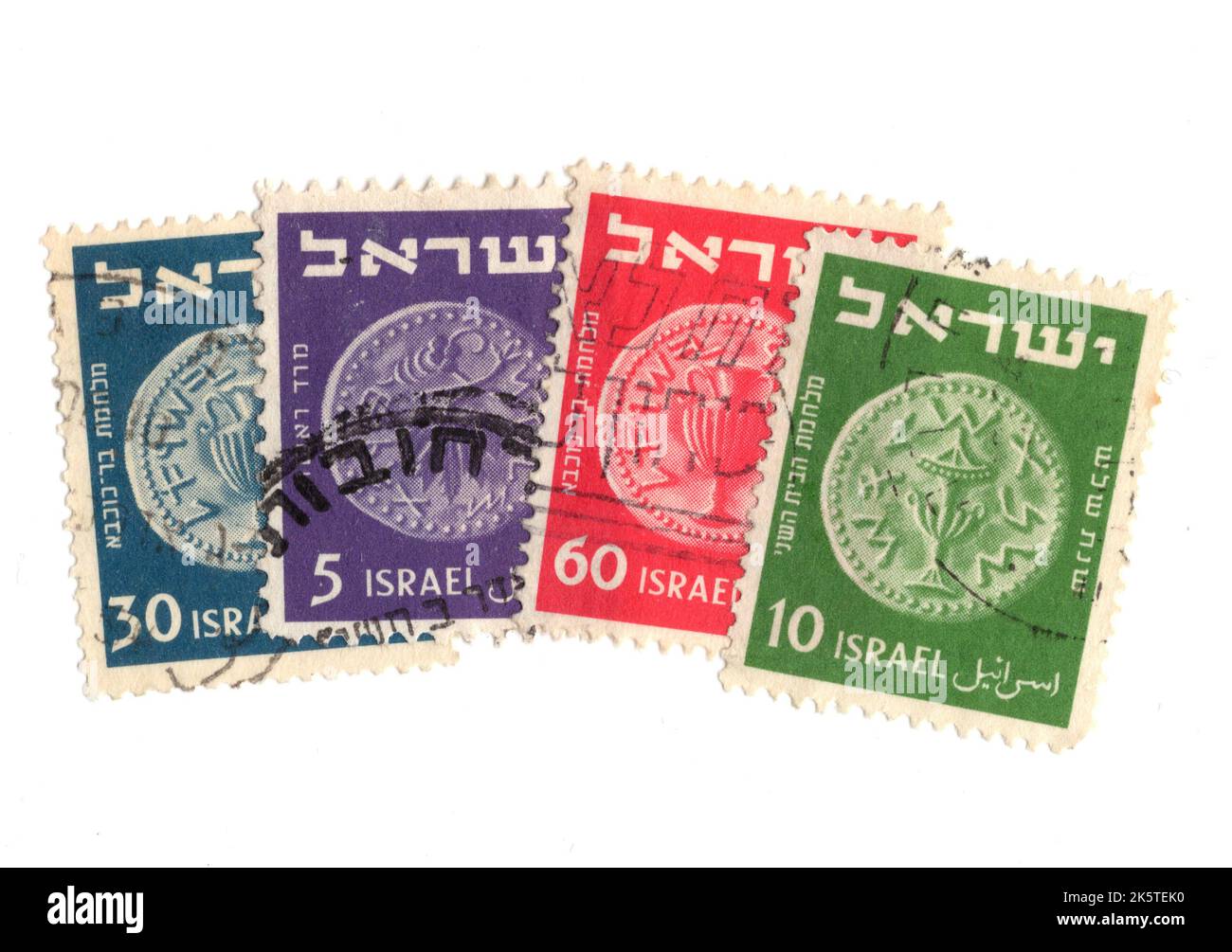 A montage of vintage postage stamps from Israel on a white background ...