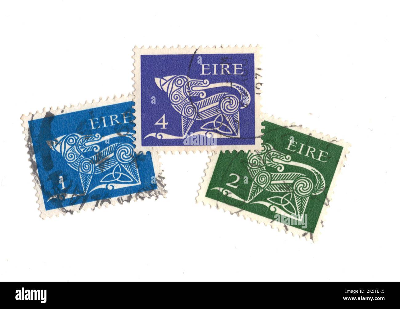 A montage of vintage postage stamps from Ireland on a white background ...