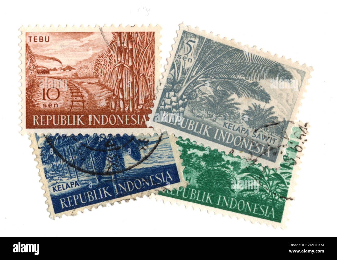 A montage of vintage postage stamps from Indonesia on a white ...