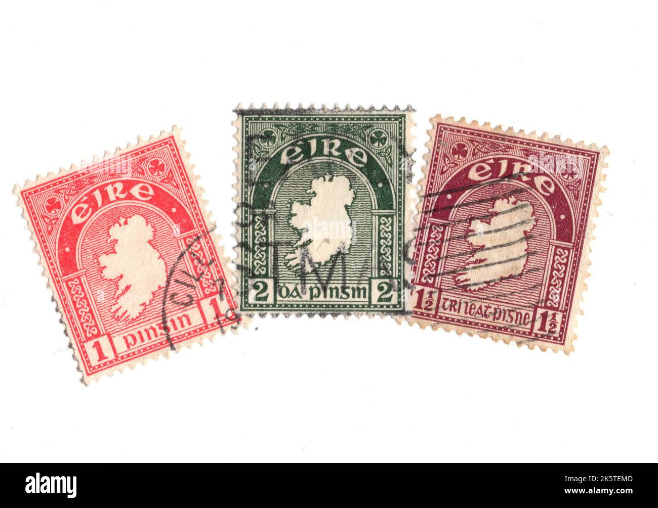 A montage of vintage postage stamps from Ireland on a white background ...