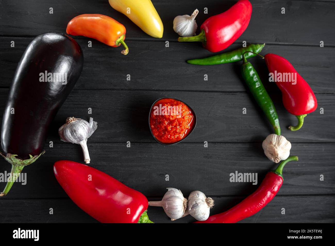 The process of preparing the dish ajvar. Ingredients red pepper, chili ...