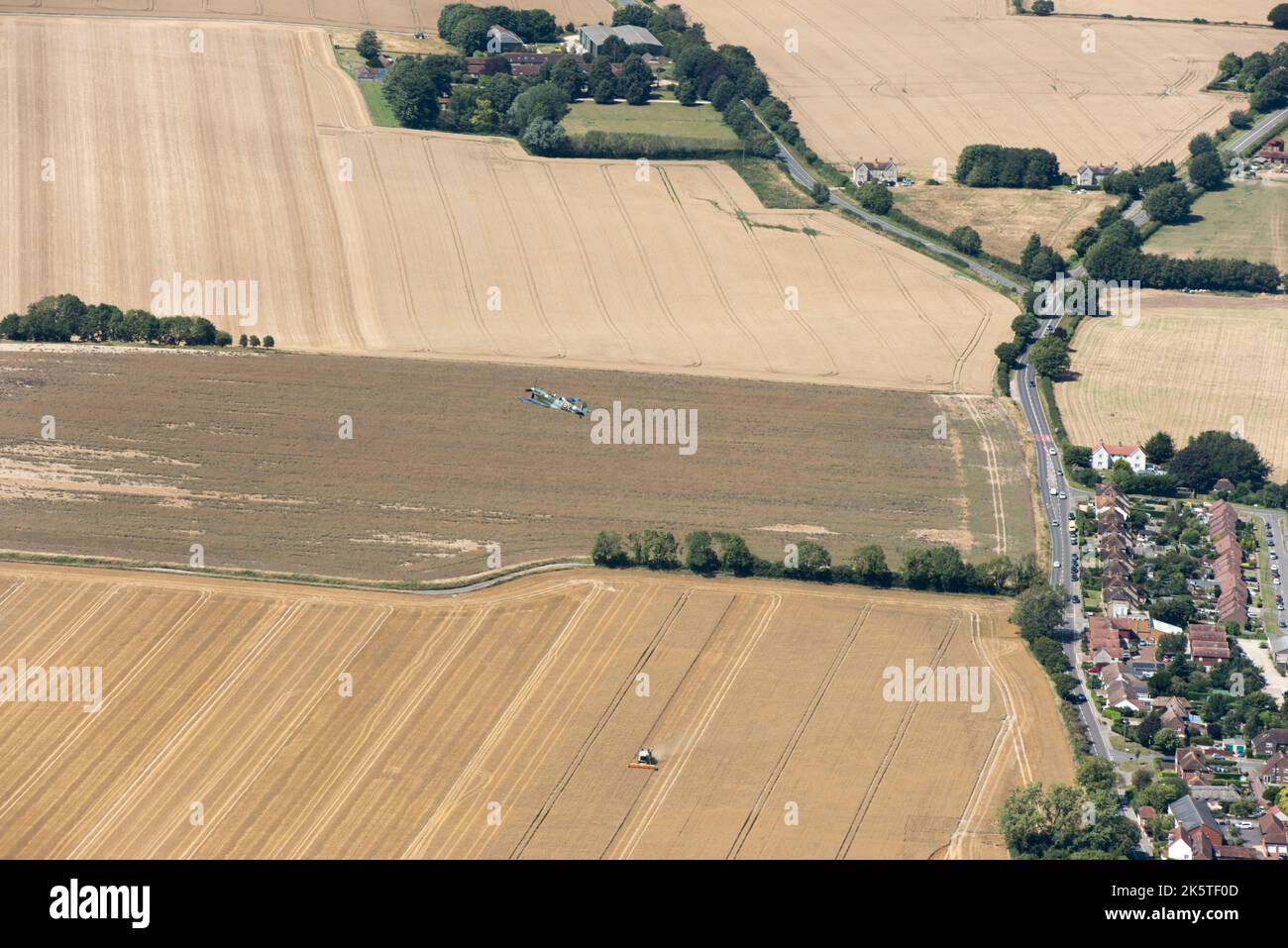 A two seat Spitfire in flight near Goodwood Aerodrome, West Sussex ...