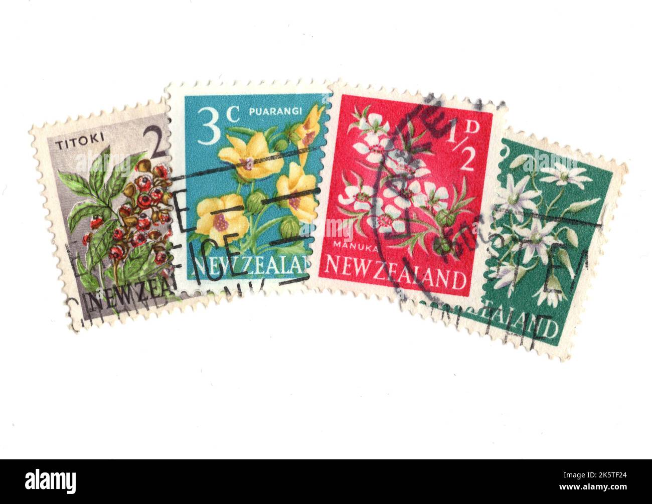 A montage of vintage postage stamps from New Zealand on a white ...