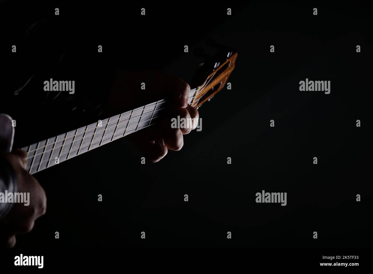 Another chords. String Cuatro instrument recording session, closeup ...