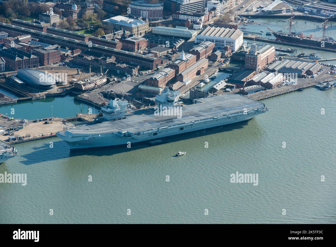 HMS Prince of Wales aircraft carrier in dock with HMS Victory in the ...