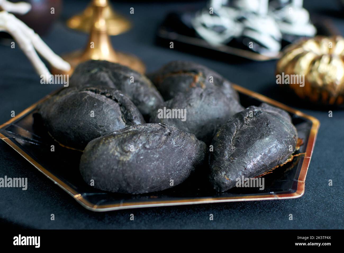 Black meat pie. Dishes for Halloween. Kibinai, kybyn, or kibin- a meat ...