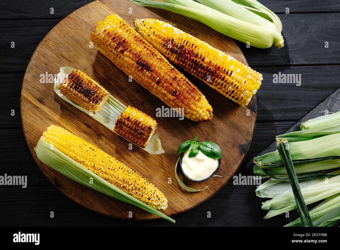 Grilled food. Charcoal and grilled corn. top view Stock Photo - Alamy
