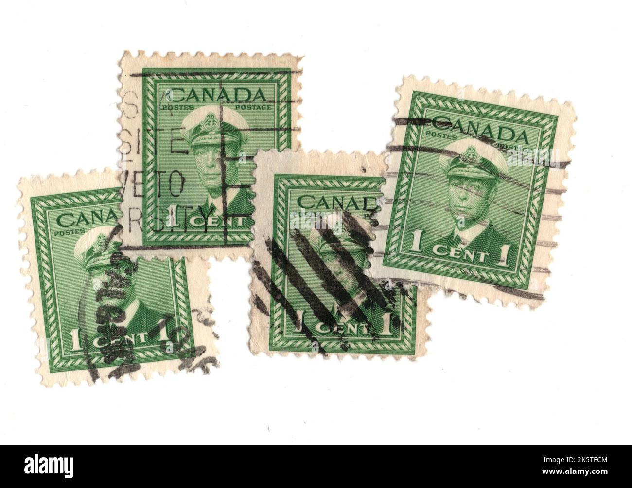A montage of vintage postage stamps from Canada on a white background ...
