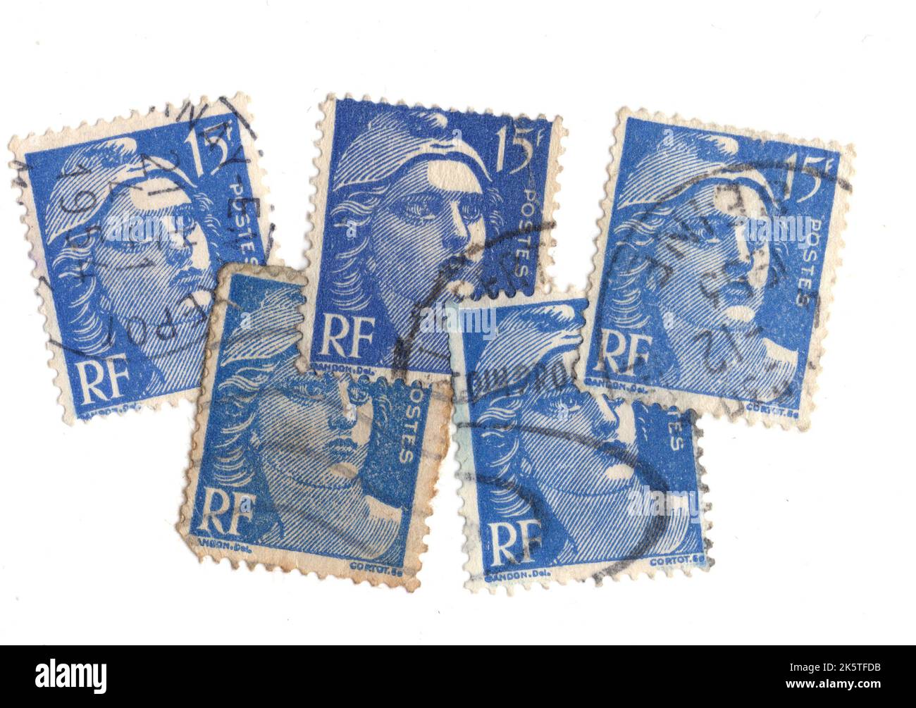 A montage of vintage postage stamps from France on a white background ...