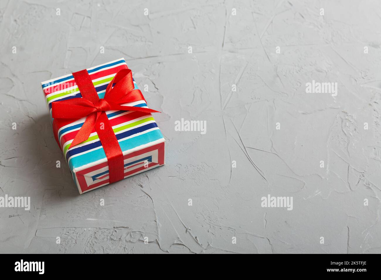 Wrapped christmas or other holiday handmade present in paper with ...