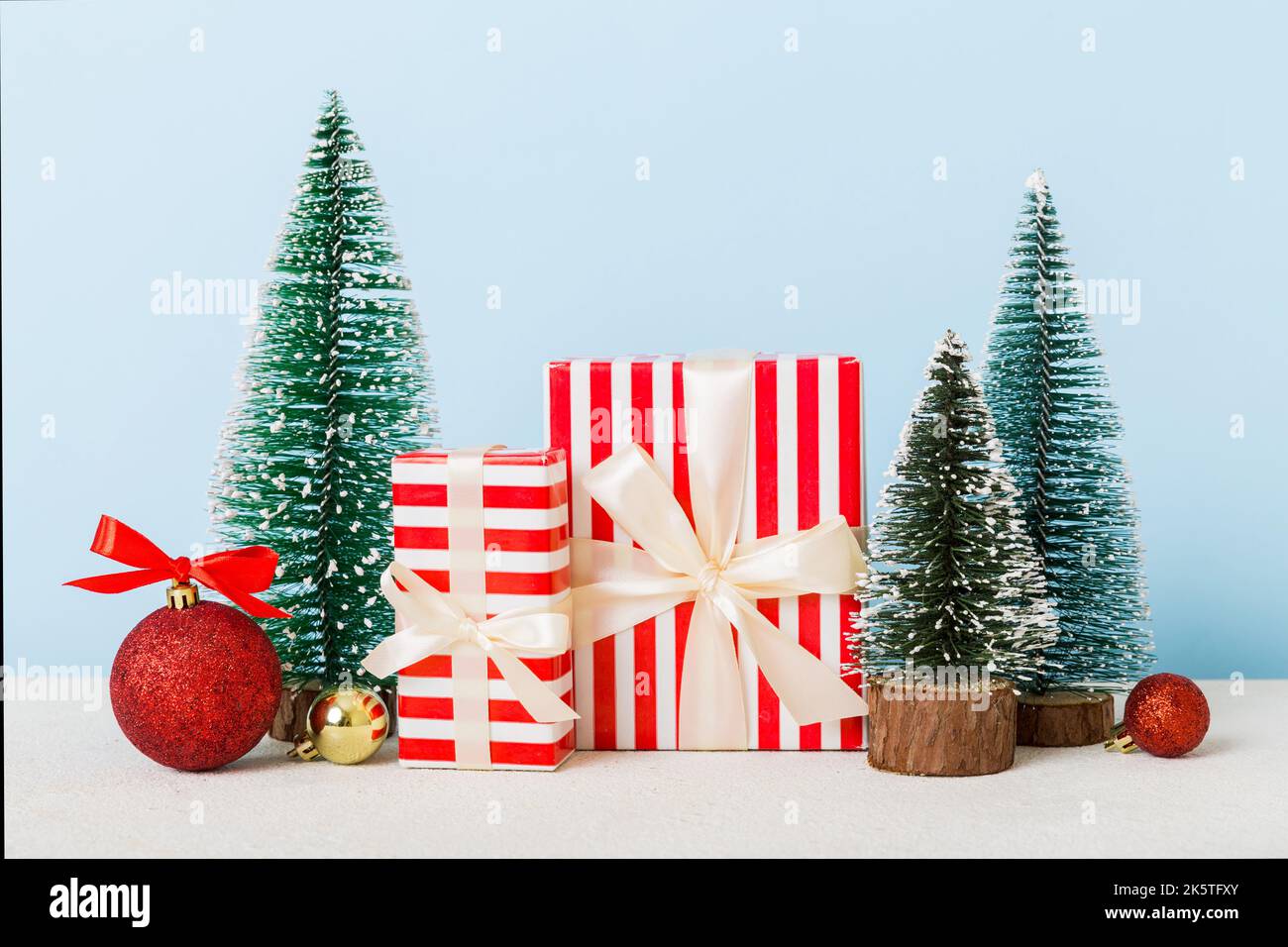 Christmas composition. craft Gift box, small tree, branches and craft ...