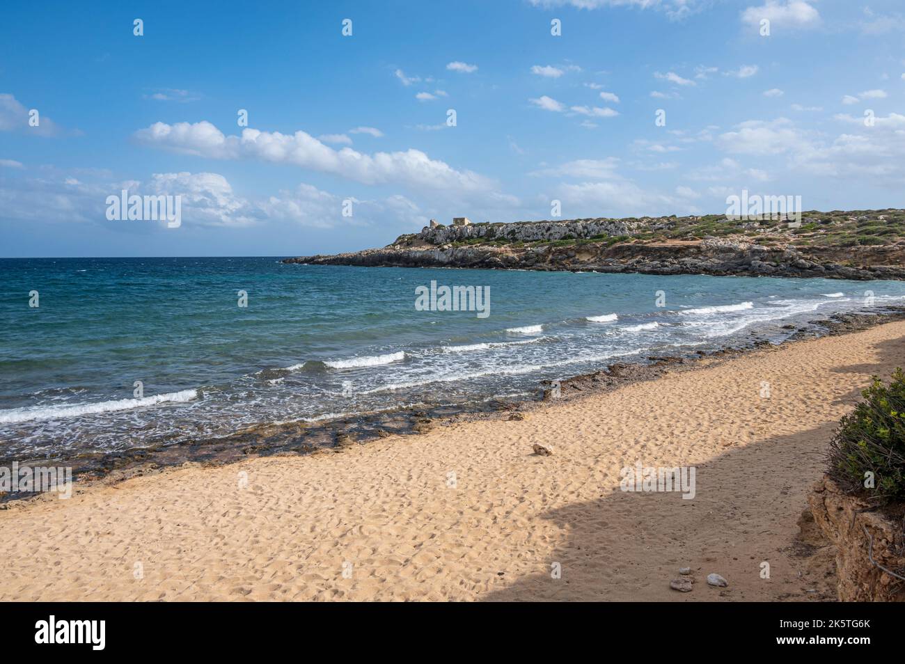 The beautiful Ognina beach in Syracuse with turquoise and green water ...