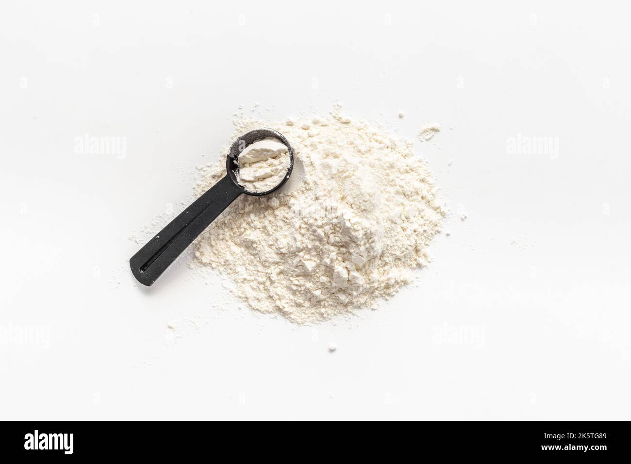Scoop with whey protein powder. Sport food supplement and gym diet ...