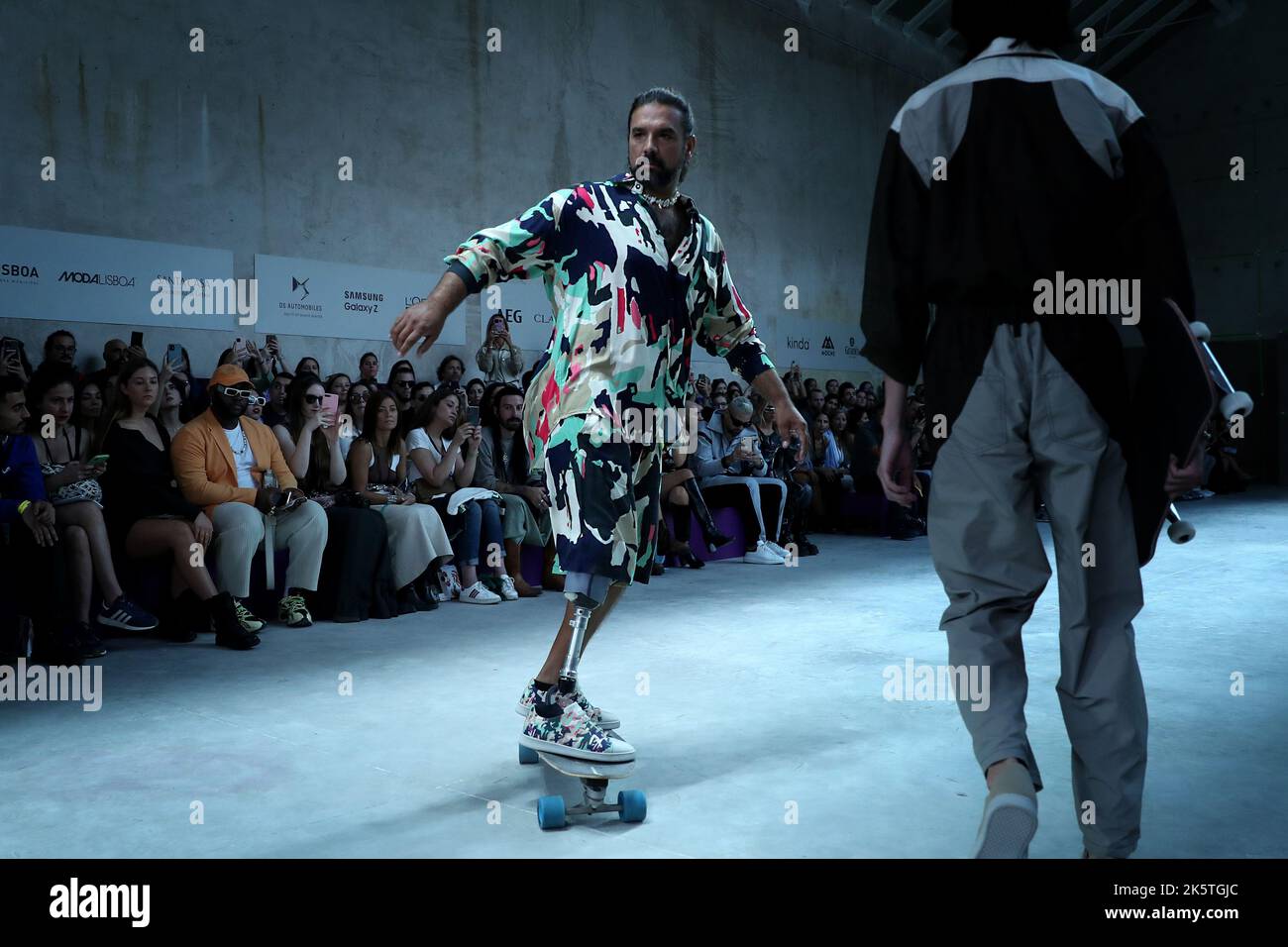 Lisbon, Portugal. 9th Oct, 2022. A model presents a creation from the ...
