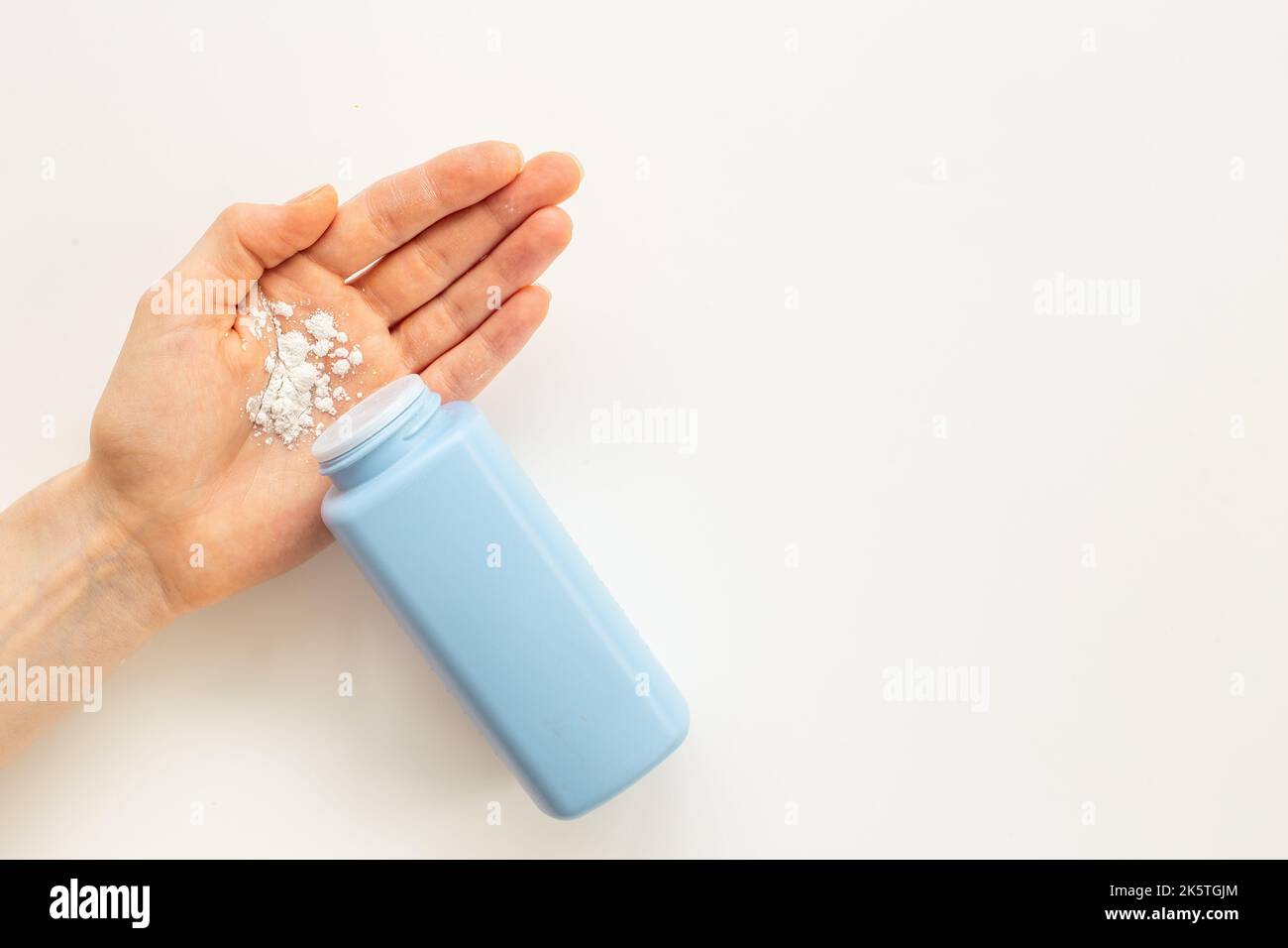 Woman applying baby talcum powder on hand. Skin care cosmetic Stock ...