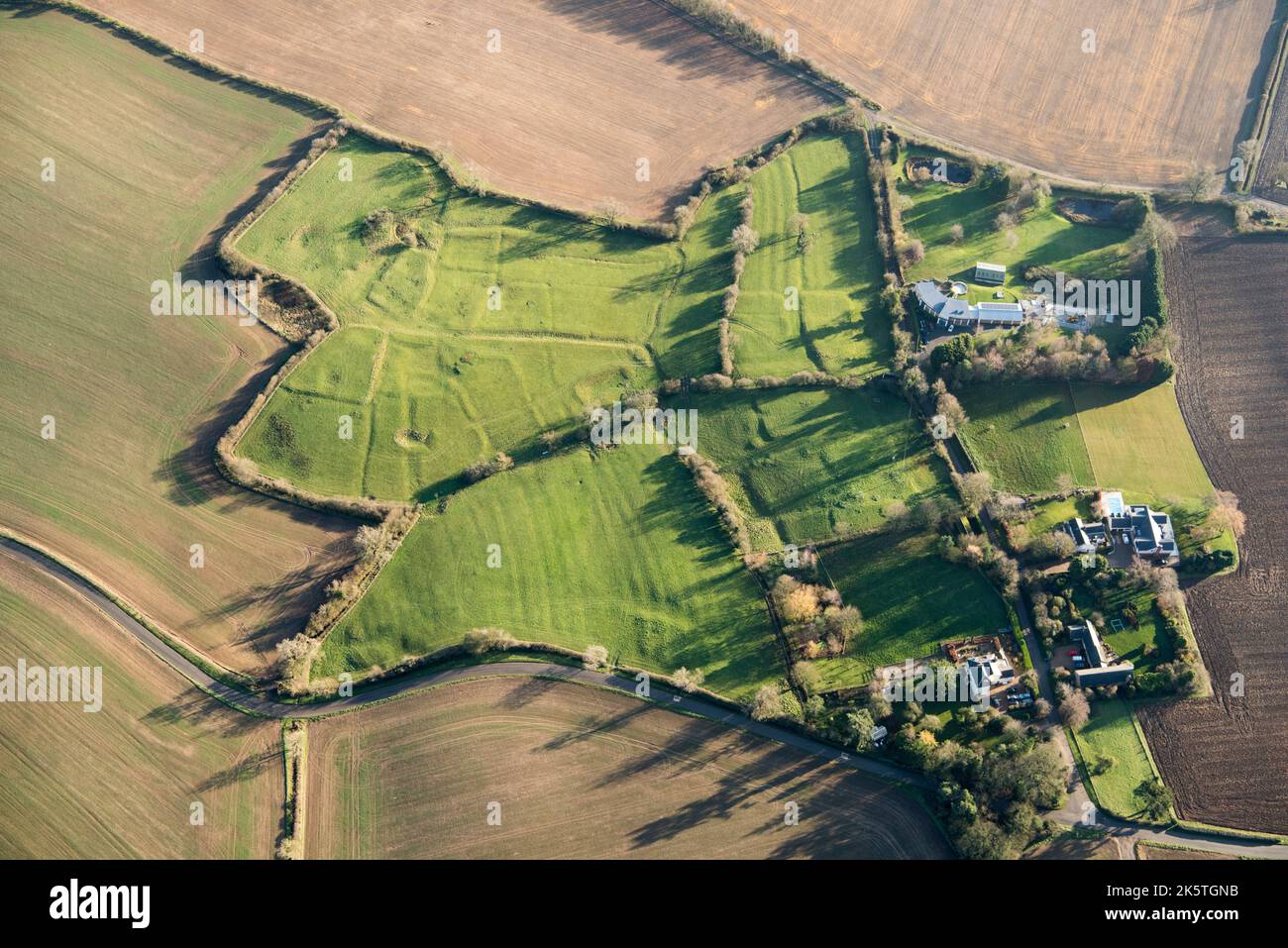 The deserted medieval settlement of Frisby and associated ridge and furrow, both showing as ...