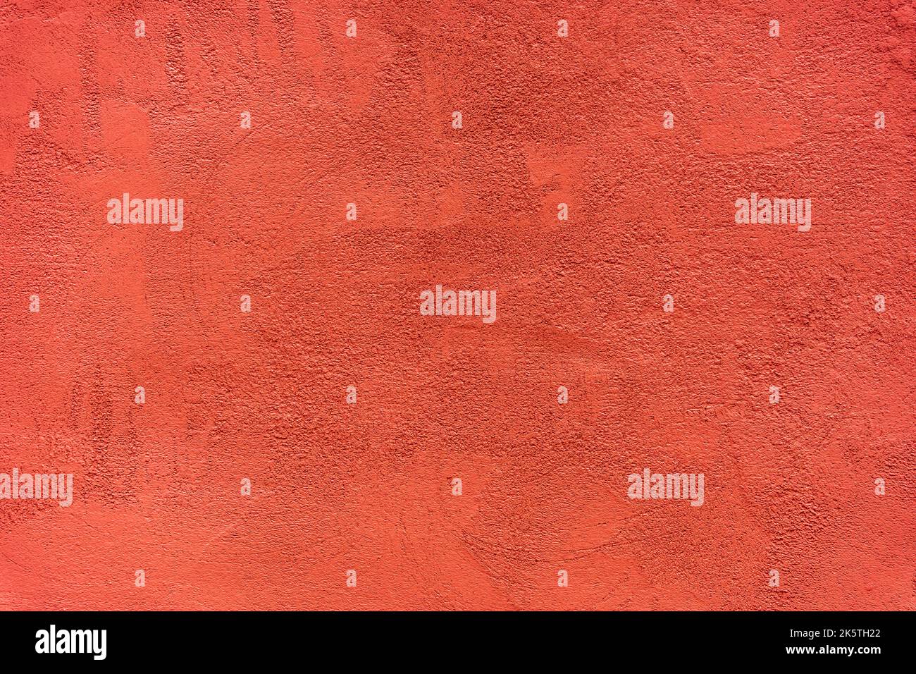 Abstract background of red textured plaster Stock Photo - Alamy
