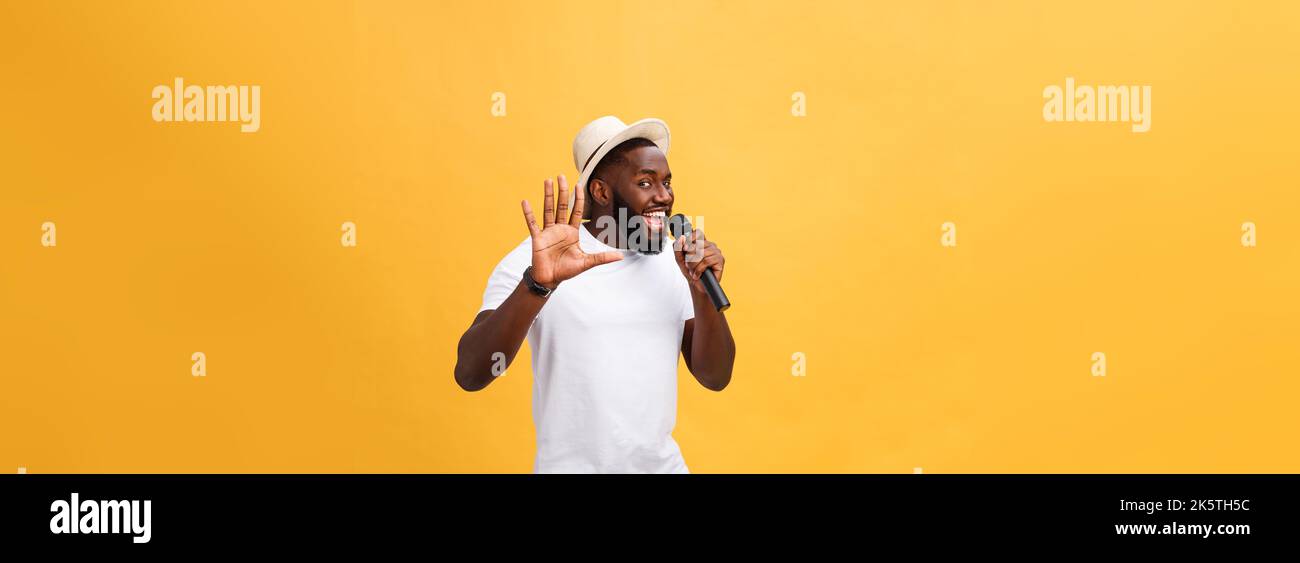 Young teenage black African American boy singer performing at a concert ...