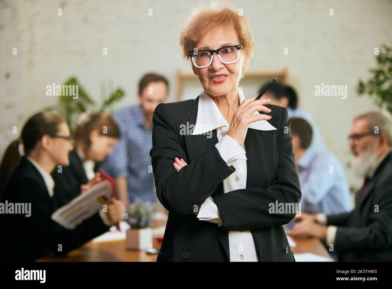 Lady boss. Portrait of senior and successful business lady. Happy smart ...