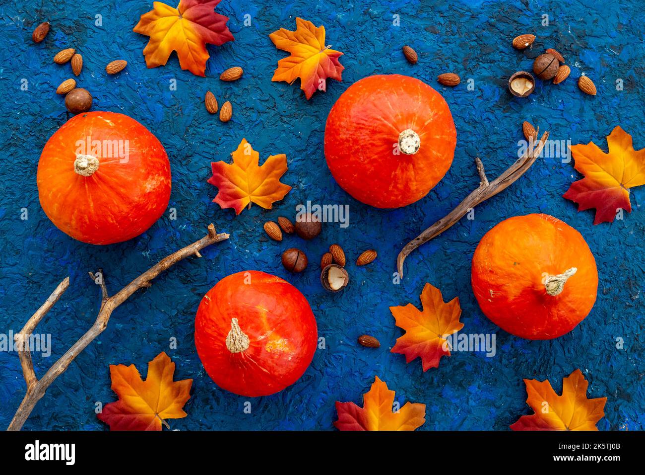 Autumn fall background with pumpkins and dry leaves, top view Stock ...
