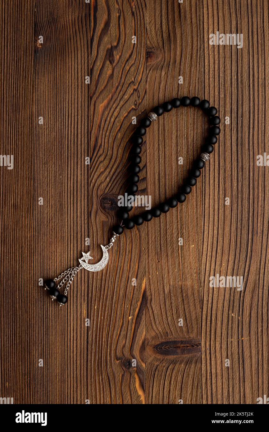 Islamic background with Muslim rosary and silver crescent moon Stock ...