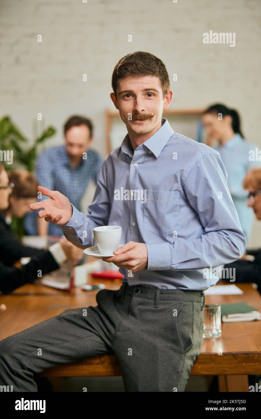 Senior developer. Happy man looking at camera and smilling. Work in ...