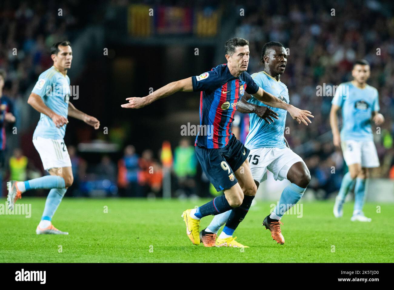 Robert Lewandowski of FC Barcelona, Joseph Aidoo of Celta Vigo during ...