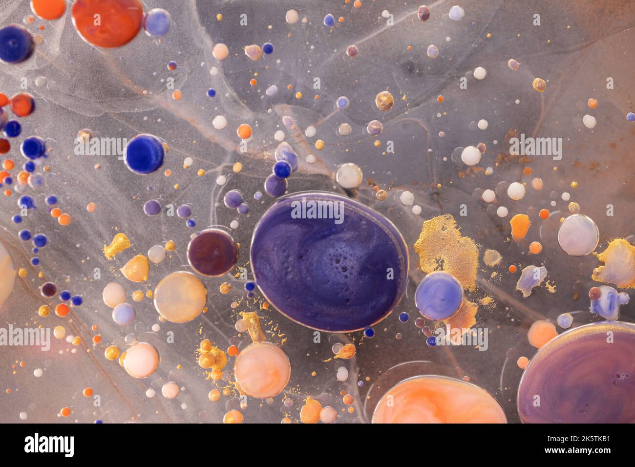 Acrylic paint balls abstract texture. Bright colors fluid, flowing ...