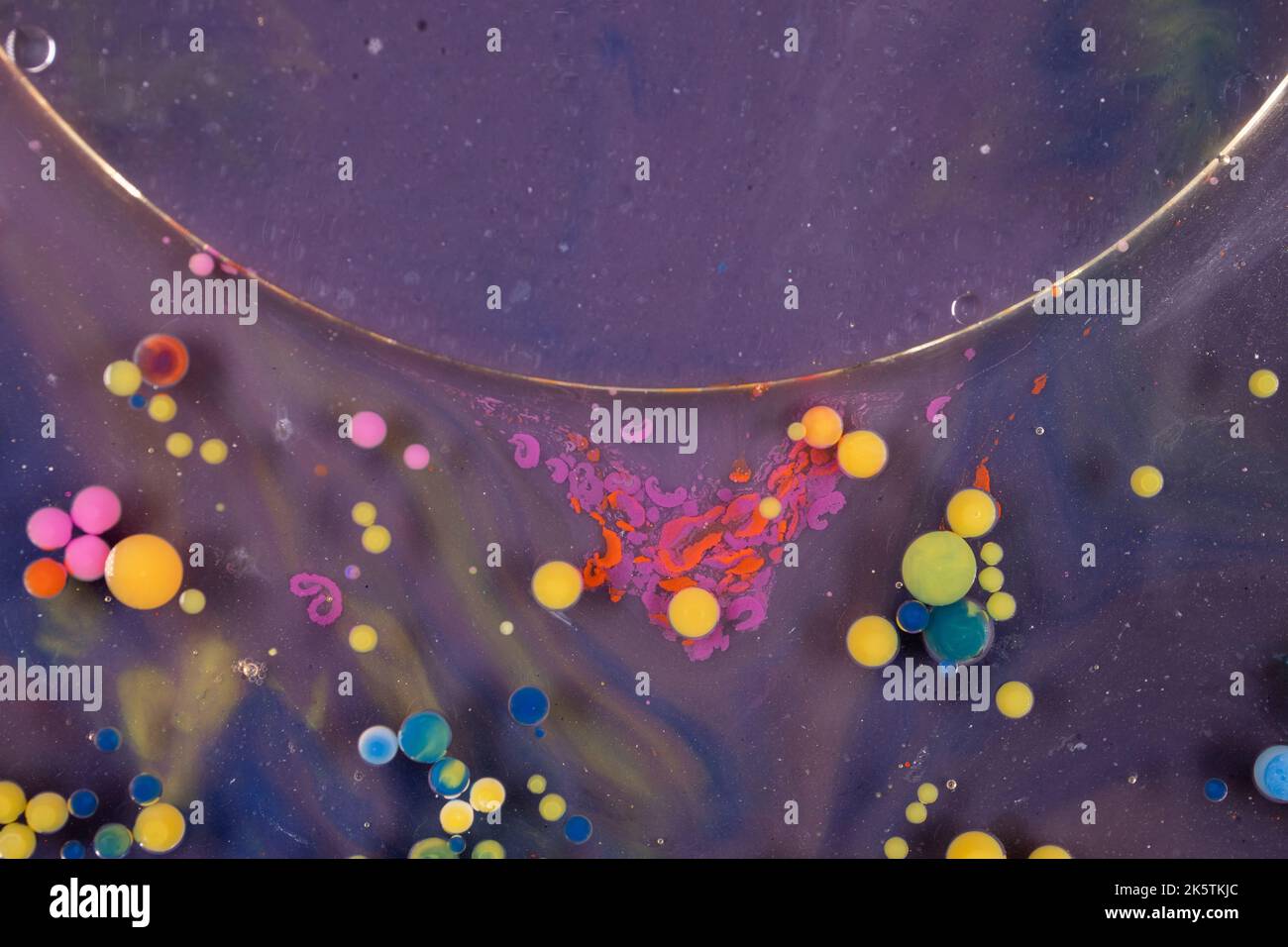 Acrylic paint balls abstract texture. Bright colors fluid, flowing ...