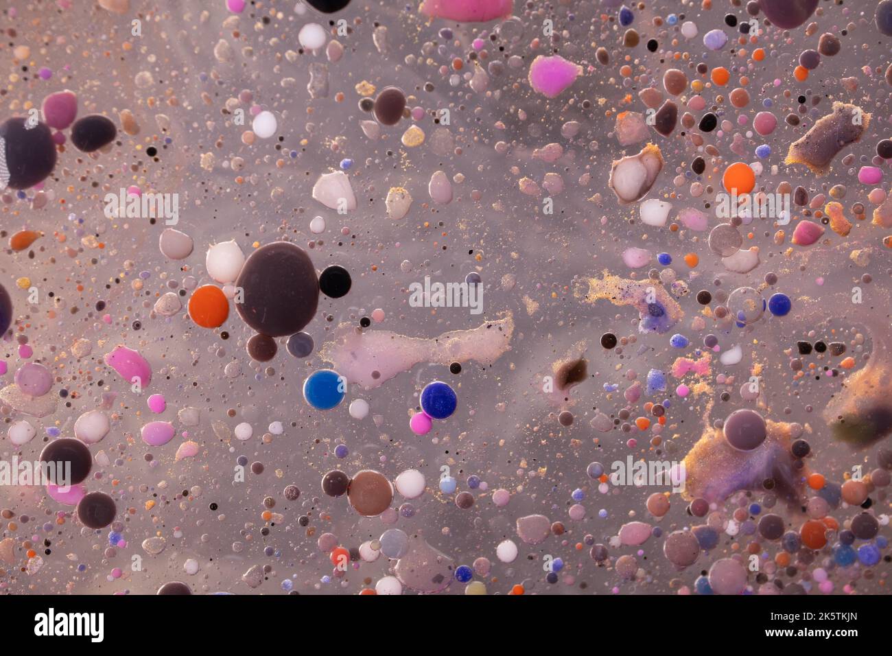 Acrylic paint balls abstract texture. Bright colors fluid, flowing ...