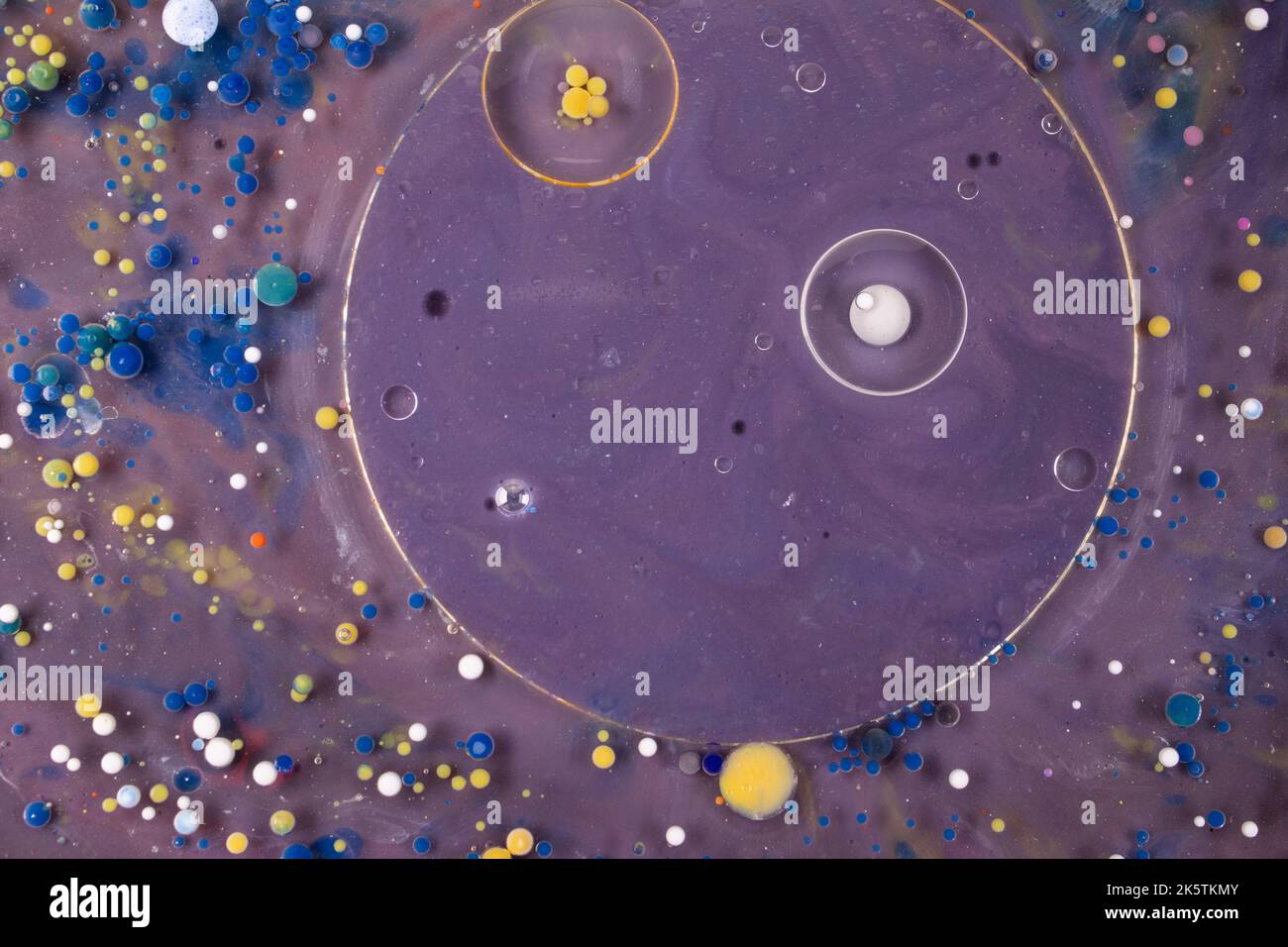 Acrylic paint balls abstract texture. Bright colors fluid, flowing ...