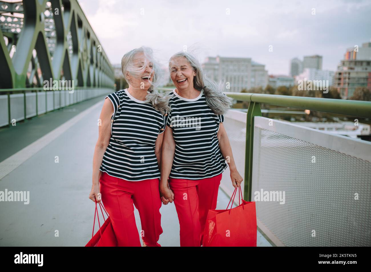 Elderly twins laughing hi-res stock photography and images - Alamy