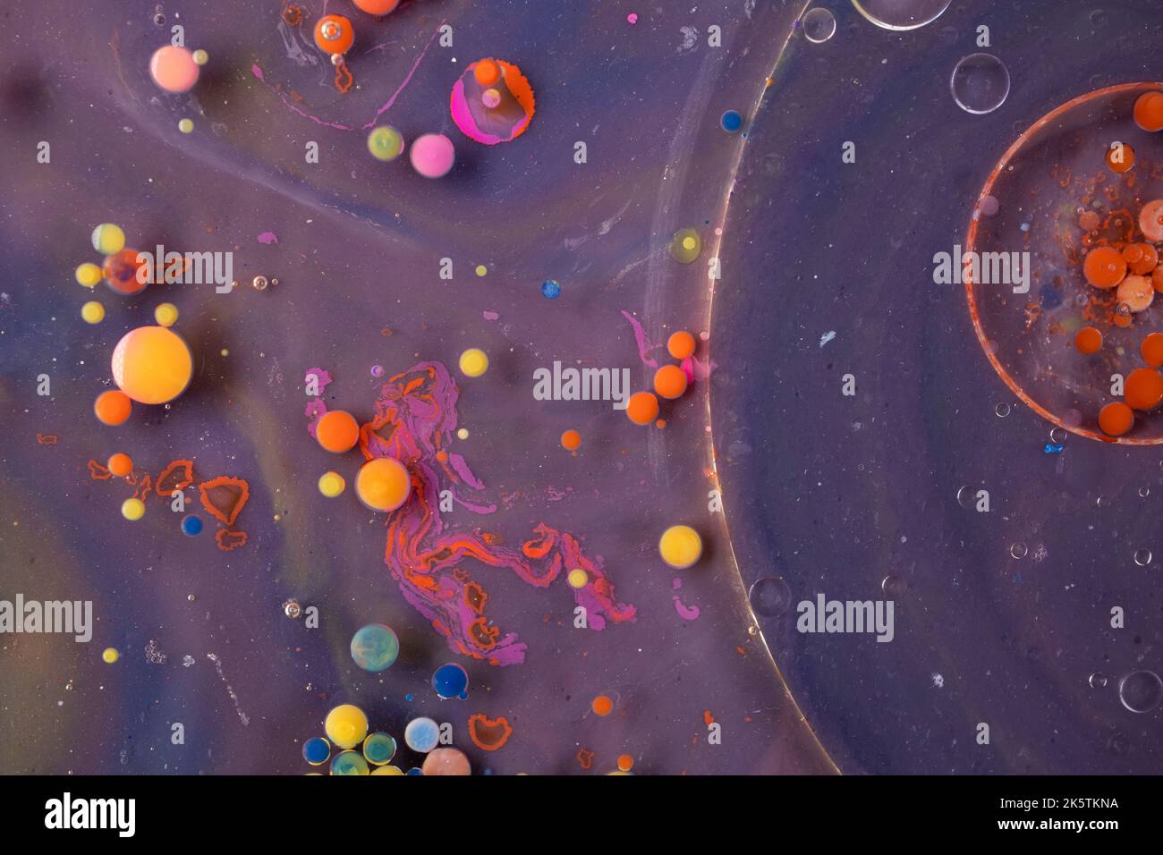 Acrylic paint balls abstract texture. Bright colors fluid, flowing ...