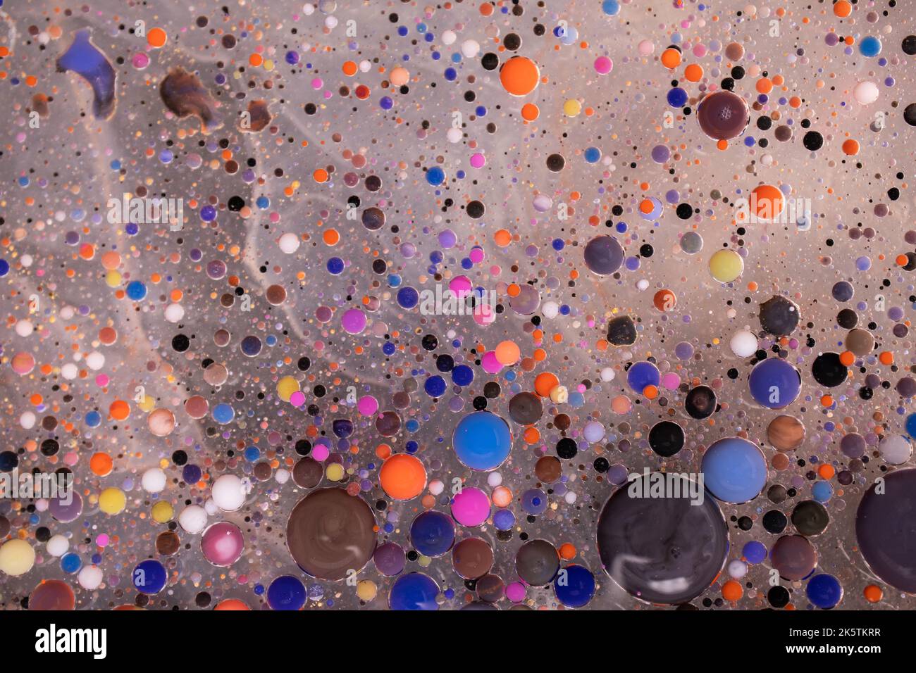 Acrylic paint balls abstract texture. Bright colors fluid, flowing ...