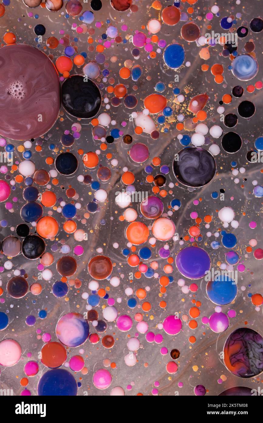 Acrylic paint balls abstract texture. Bright colors fluid, flowing ...