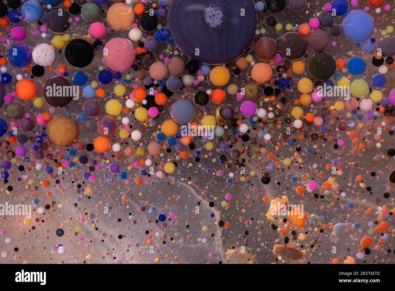 Acrylic paint balls abstract texture. Bright colors fluid, flowing ...