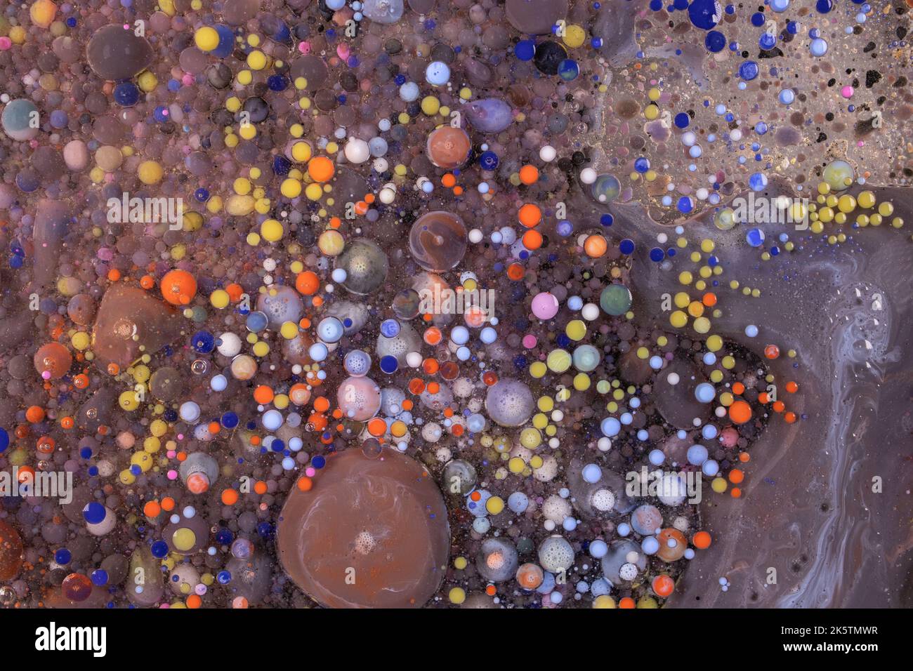 Acrylic paint balls abstract texture. Bright colors fluid, flowing ...