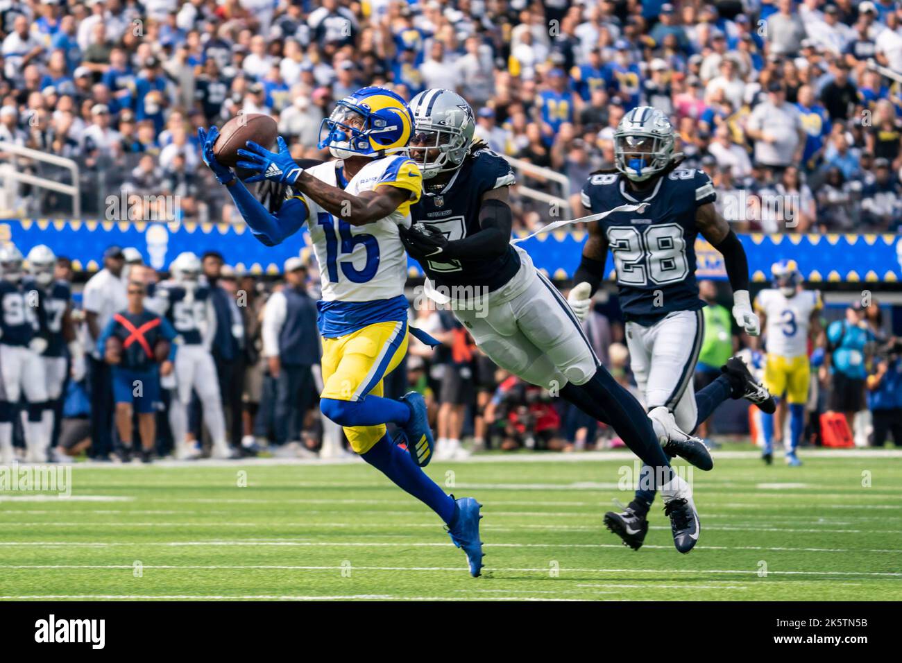 Los Angeles Rams wide receiver Tutu Atwell (15) makes a catch against Dallas Cowboys cornerback ...