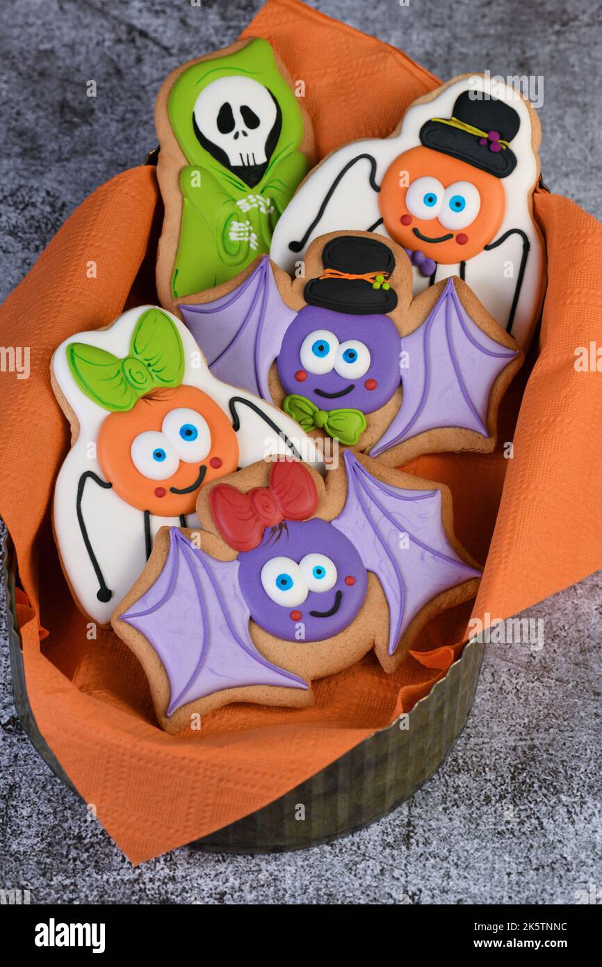 Happy Halloween with funny characters on gingerbread cookies; bat ...