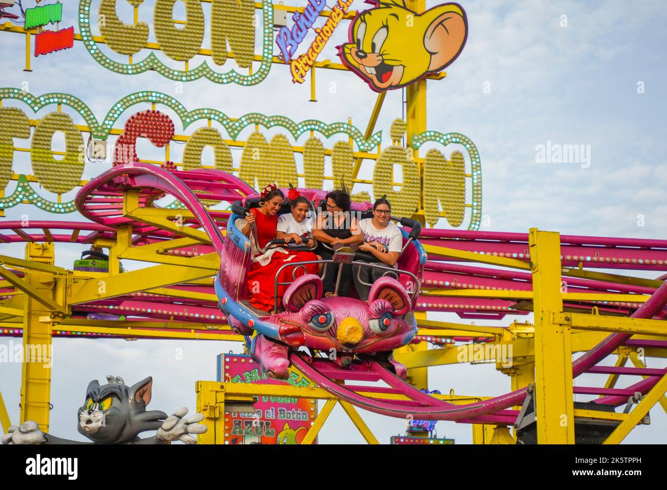 Four women on highest point, scared in Roller coaster car ride on ...