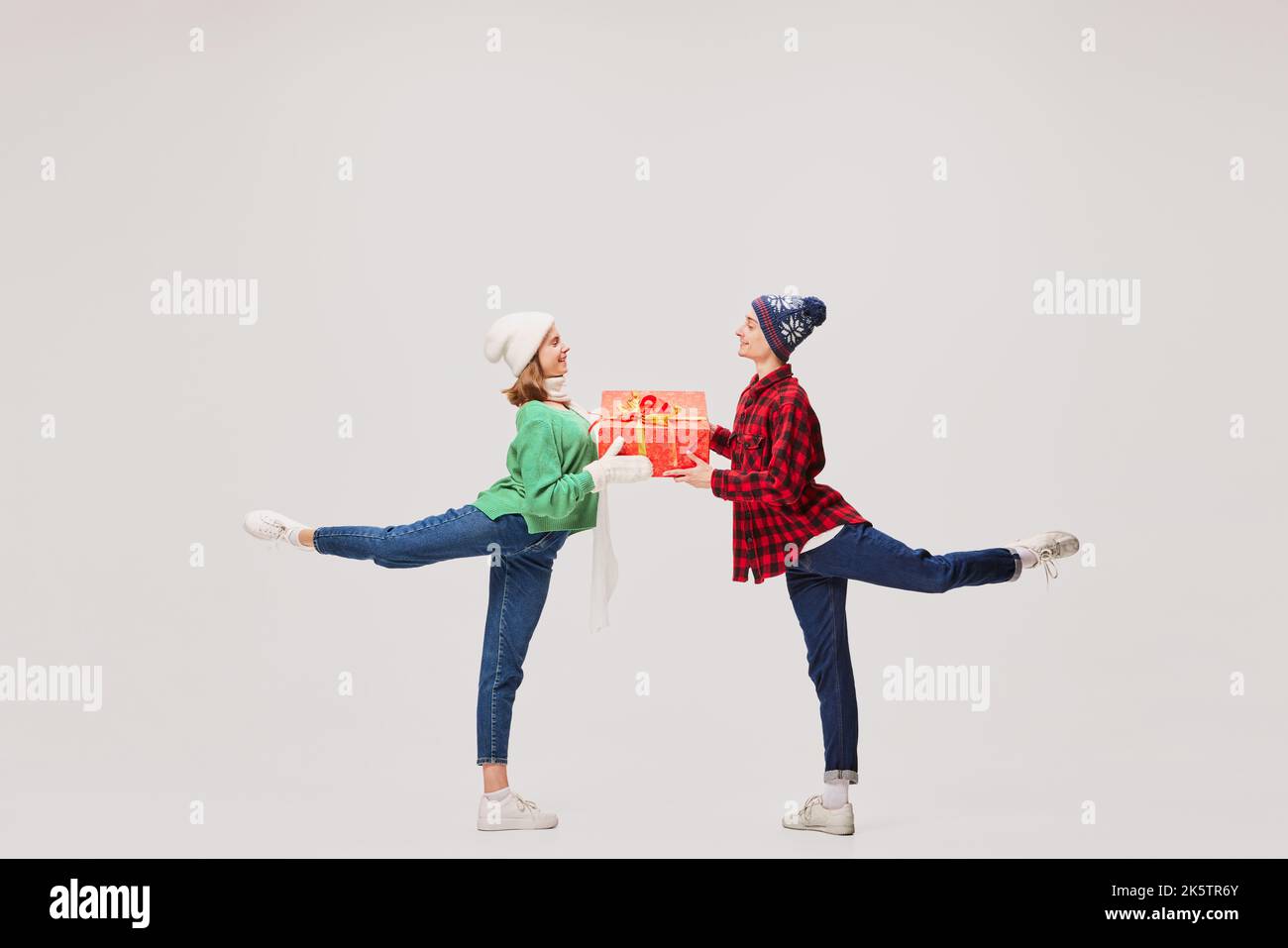 Emotional young people, ballet dancers in warm clothes in action ...