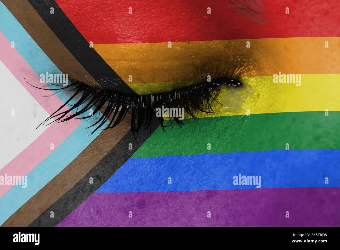 Closeup of an eye with a tear, Progress LGBTQ Rainbow flag Stock Photo ...