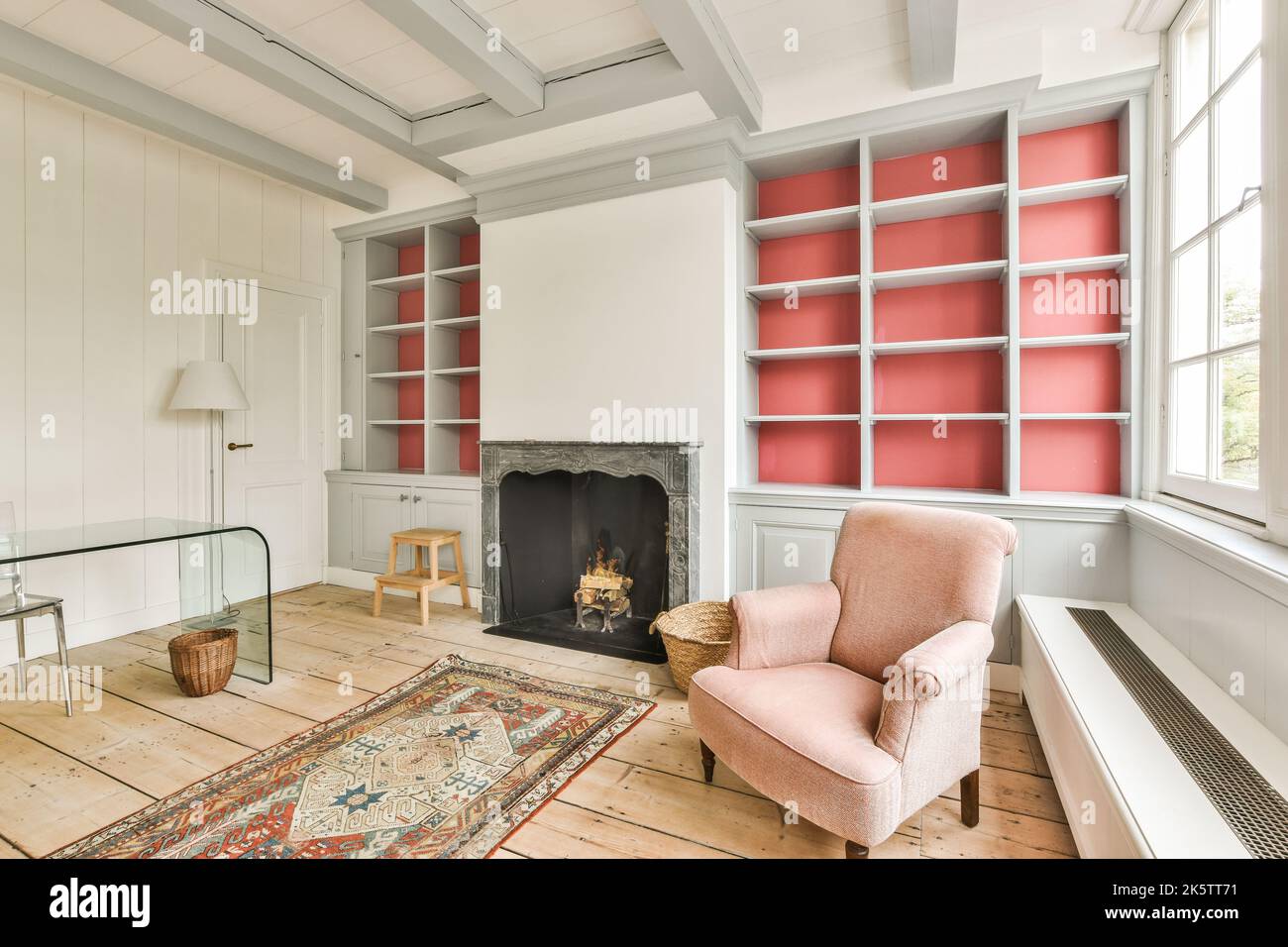Minimalist interior of study room with fireplace and white walls ...