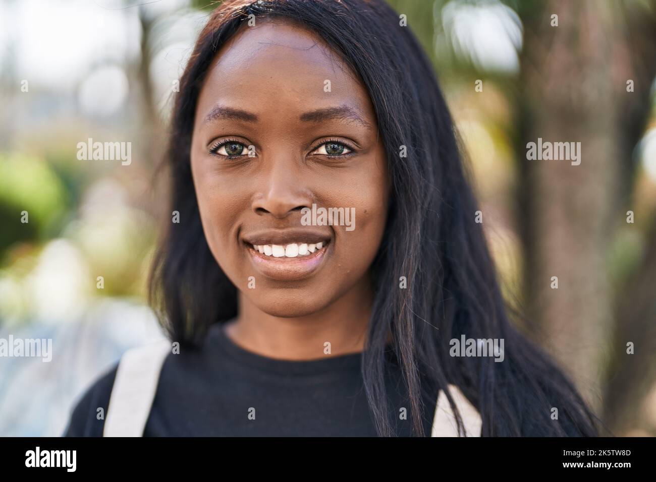 Young African American Woman Smiling Confident Standing At Park Stock