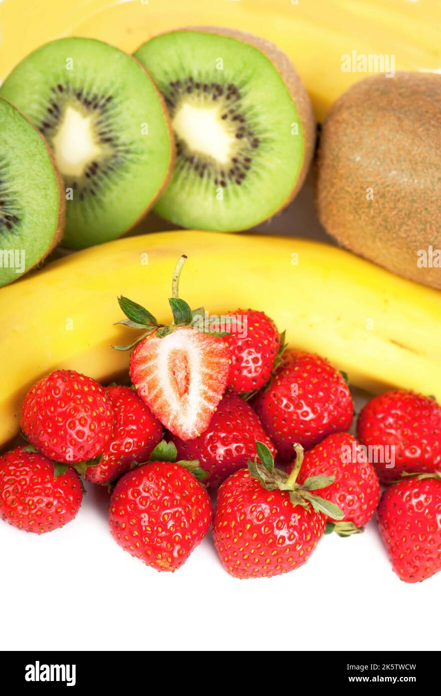 Bananas, kiwi and strawberry lose up isolated on a white background ...
