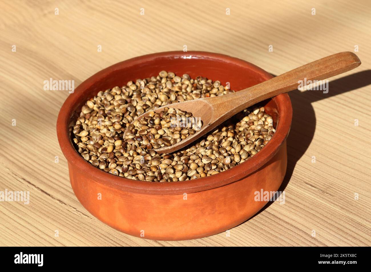 roasted hemp seeds in the plate Stock Photo - Alamy