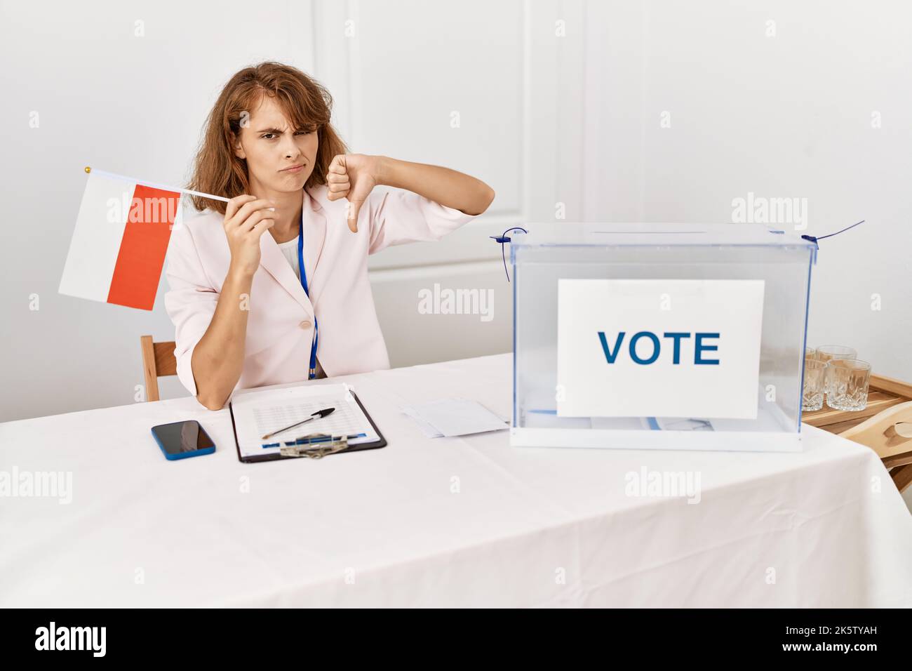 Beautiful caucasian woman at political campaign election holding poland ...