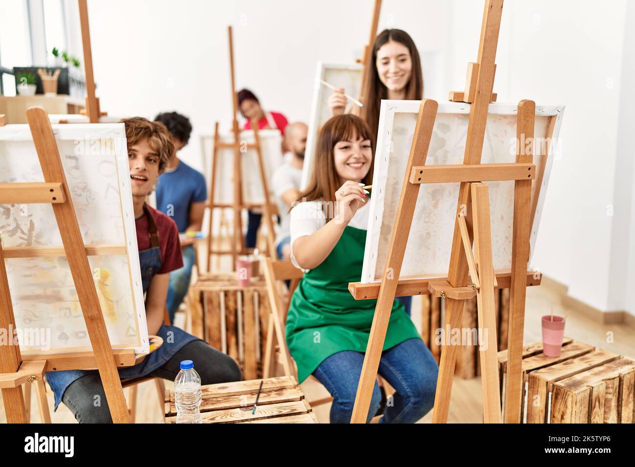 Group of young draw students smiling happy drawing at art studio Stock ...