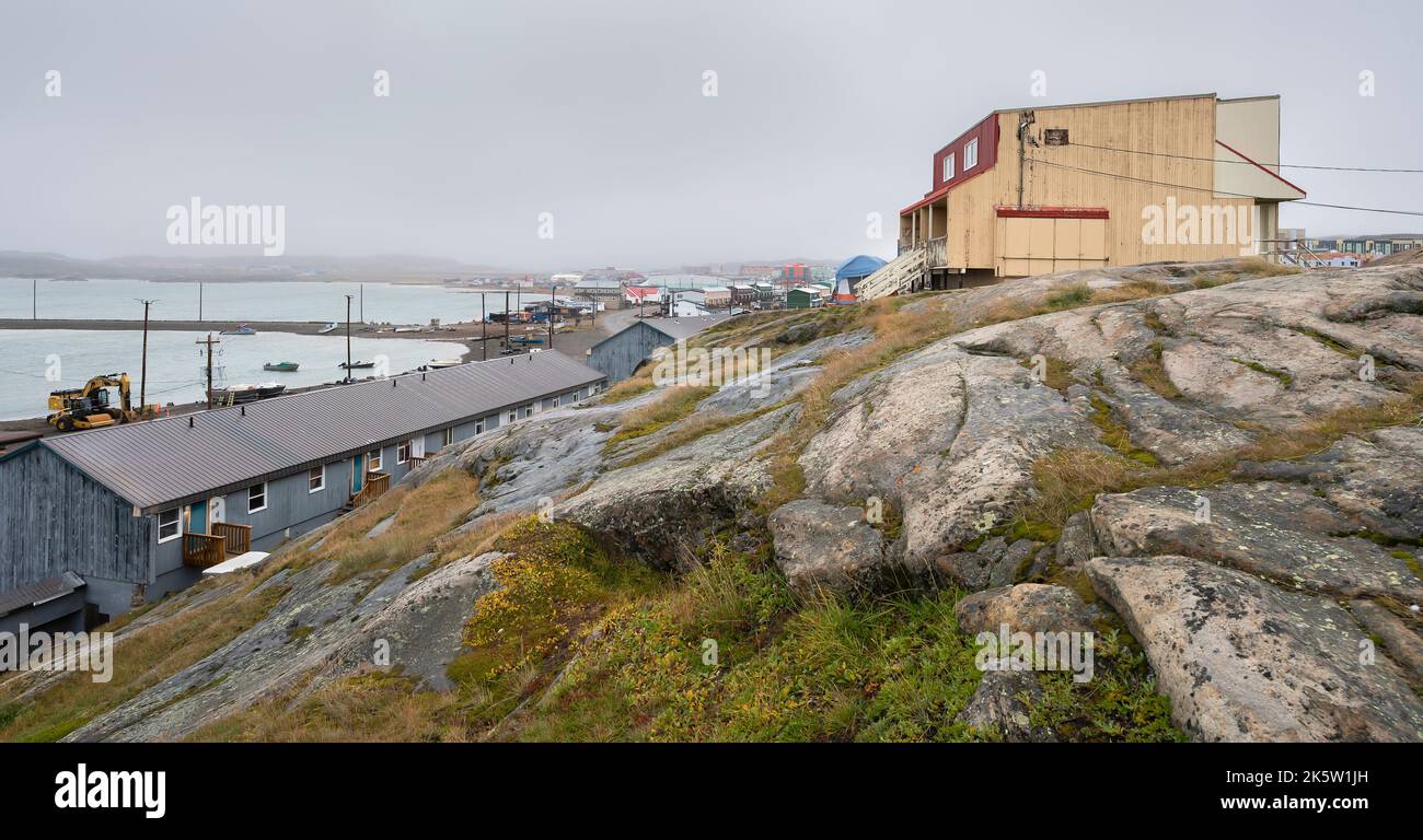 Houses on a Rocky Ridge overlooking the Arctic Ocean and harbor in ...