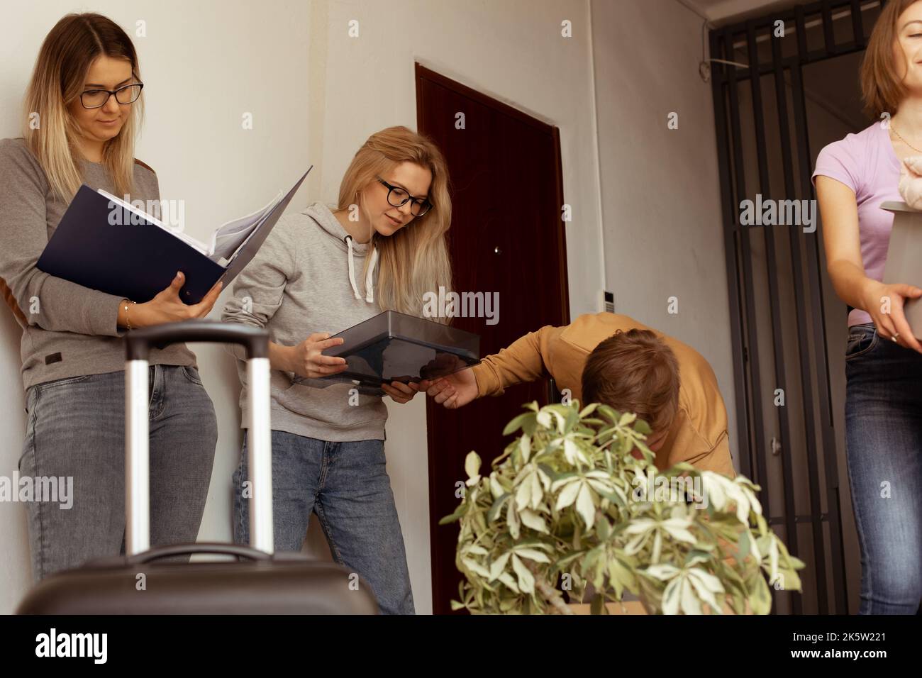 Concentrated female students move out old room in campus to new place ...